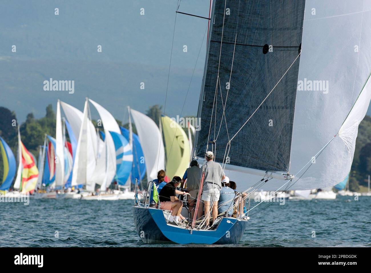Sailing boats cross the starting line of the "Bol d' Or", a sailboat ...