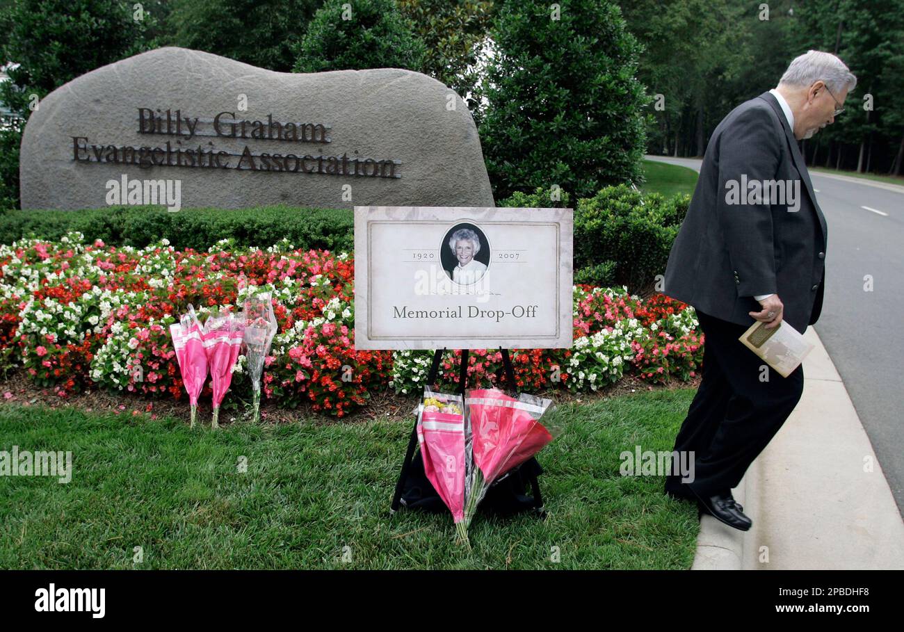 David Meyer walks away after looking at a memorial for Ruth Graham at ...