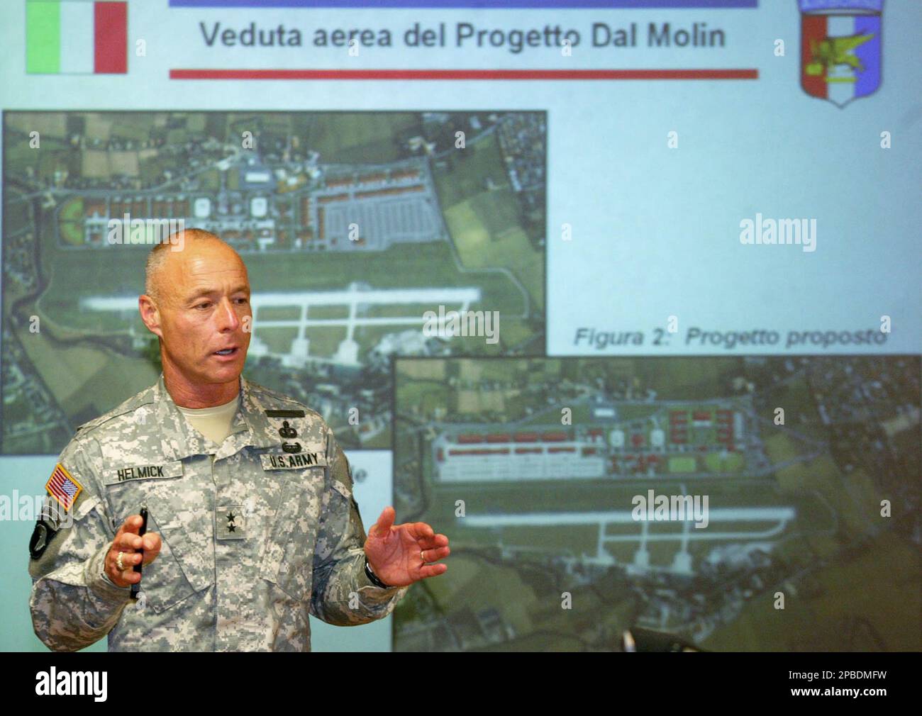 U.S. Army General Frank Helmick gestures at a press conference on the ...