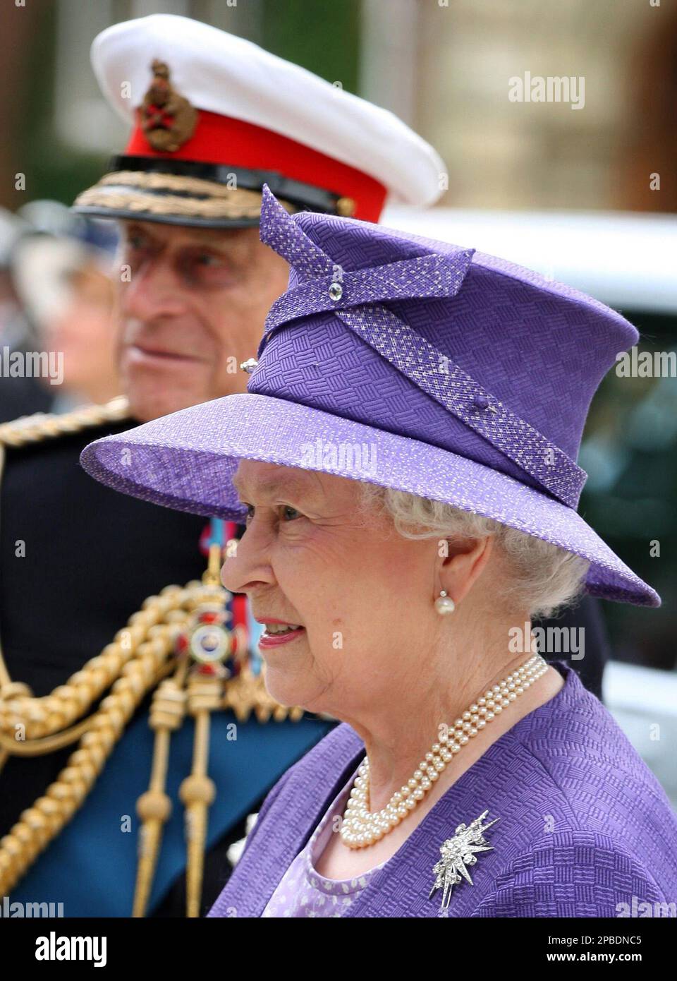 Britain's Queen Elizabeth II and Prince Philip arrive to attend a ...