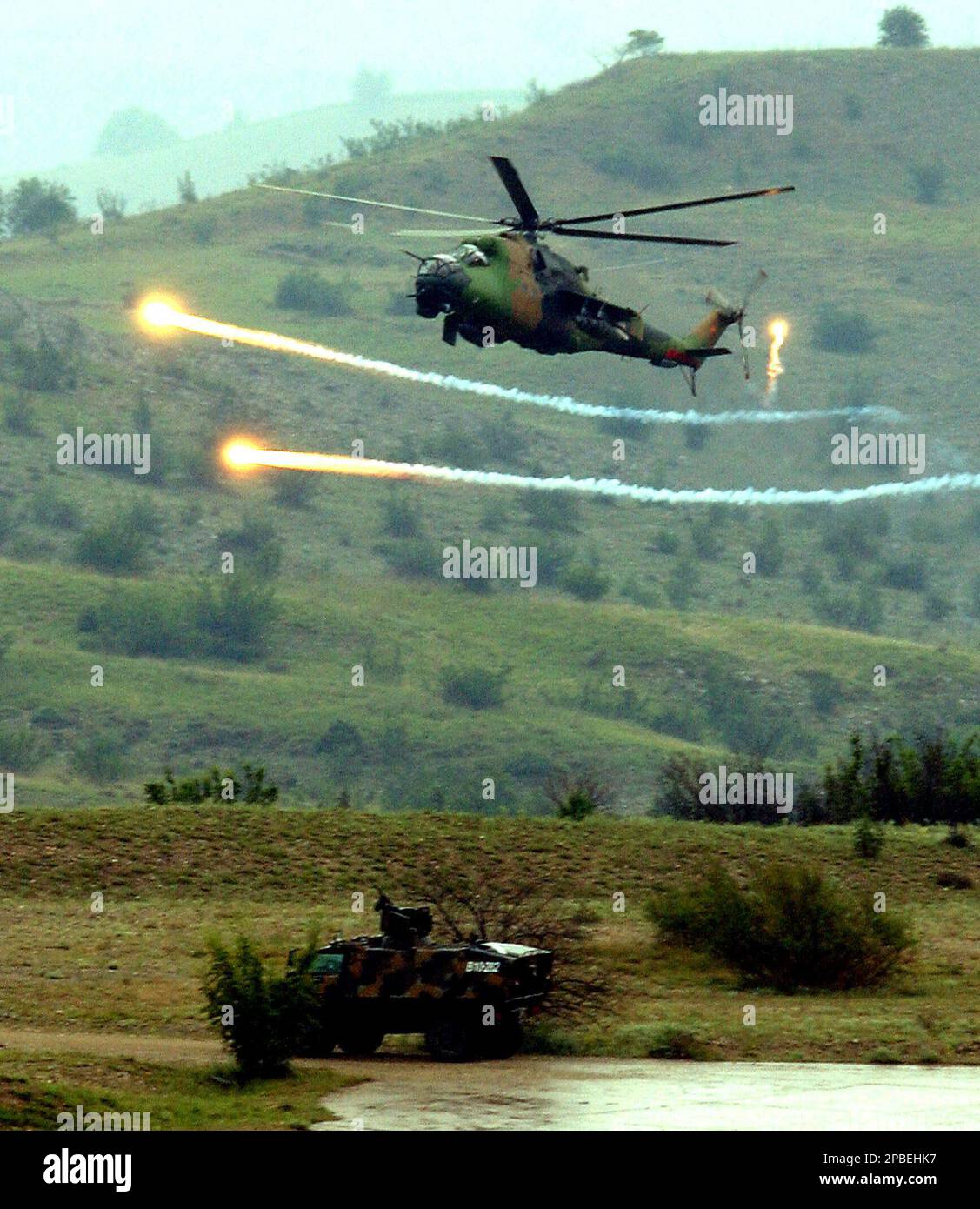 A Macedonian Army MI-24 gunship helicopter flies by during a live fire ...