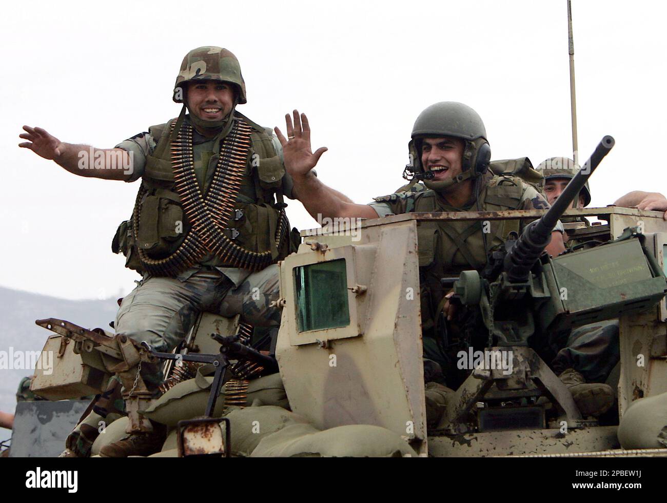 Lebanese army soldiers from navy commandos units, atop their armored ...