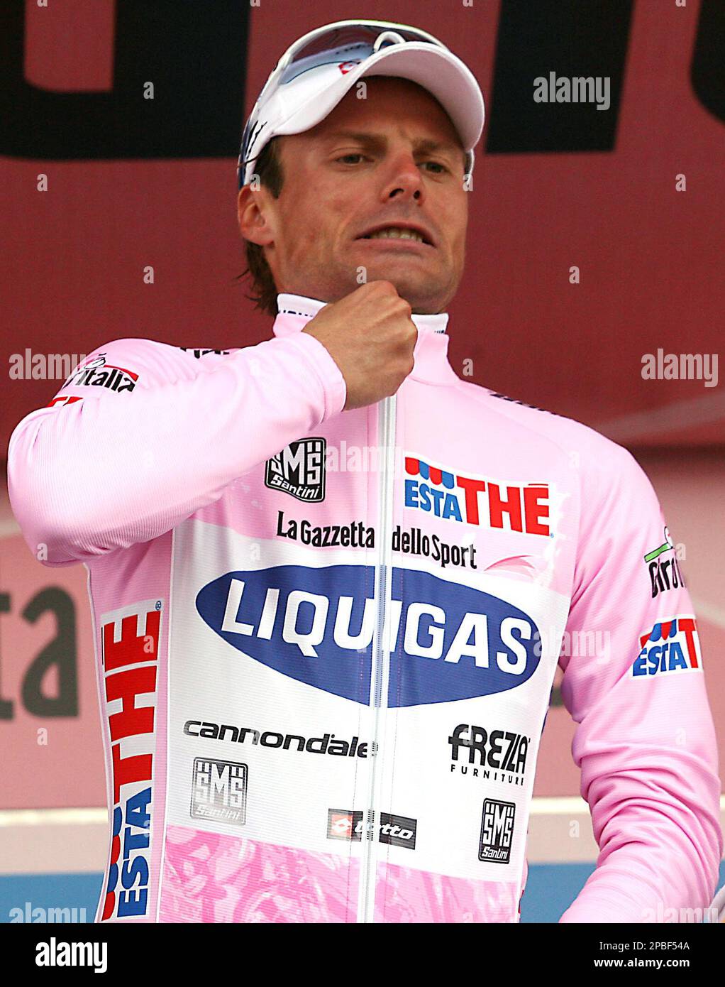 Italy's Danilo Di Luca wears the pink jersey of the overall leader ...