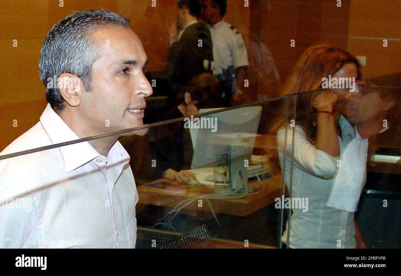 Suspect Mohammed M'Barek and his sister Jamila stand at the start of ...