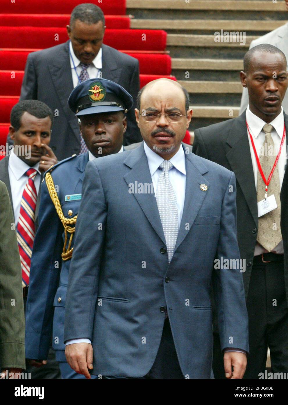 Ethiopian Prime Minister Meles Zenawi, surrounded by bodyguards arrives for the 12th Summit of ...