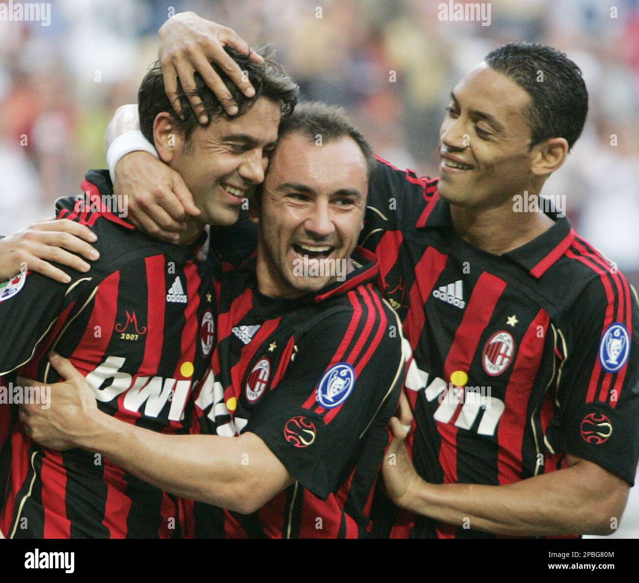 AC Milan's Alessandro Costacurta, left, celebrates with his teammates ...