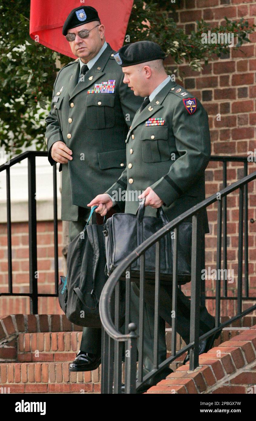 ** FILE ** Lt. Col. Steven L. Jordan, left, leaves the military court ...