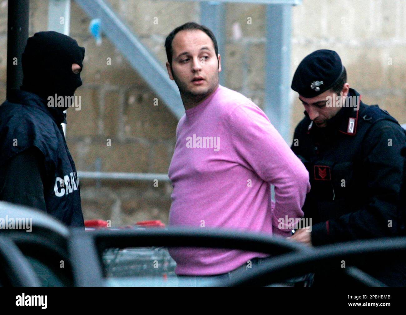 Italian Carabinieri paramilitary police officers arrest Michele Russo ...