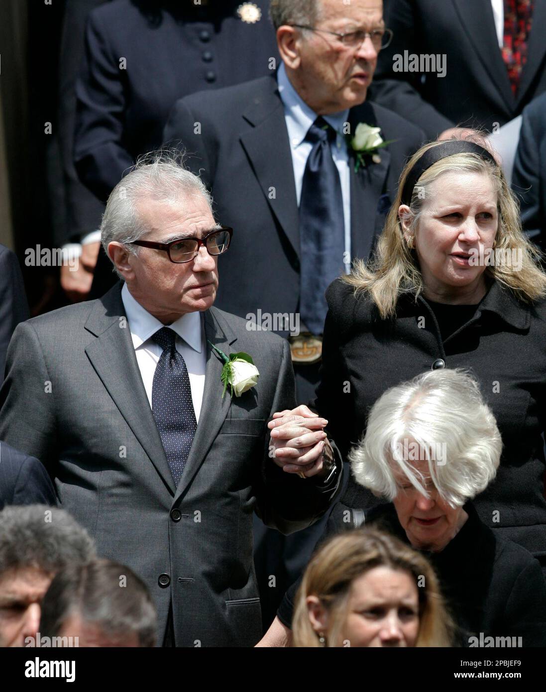 Director Martin Scorsese, left, and his wife Helen, hold hands as they ...