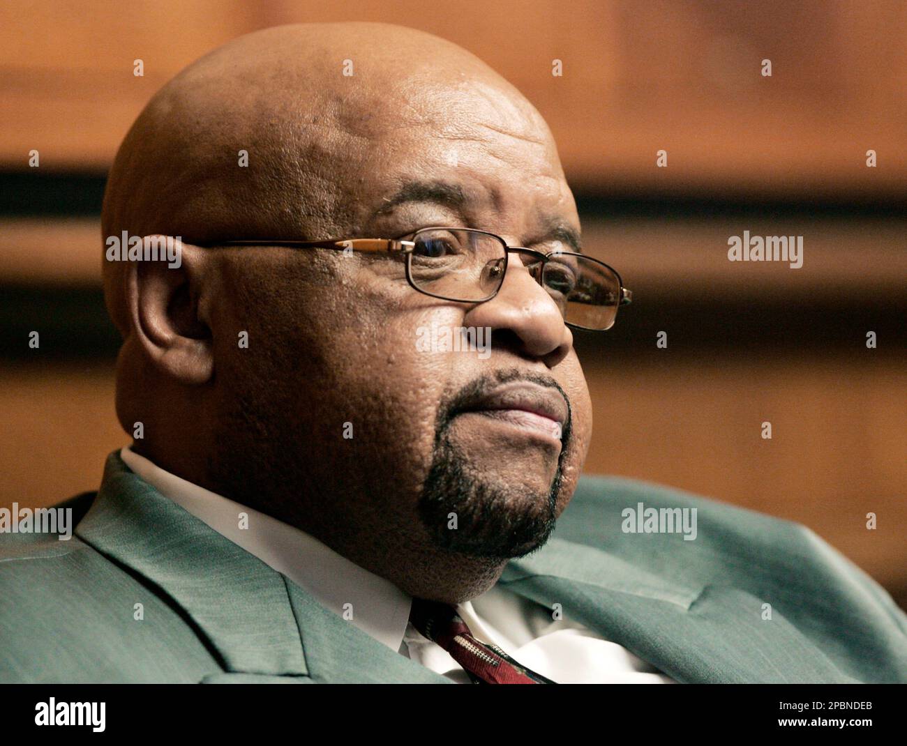 The Rev. Artis Caver sits in court as a defendant in a civil suit ...