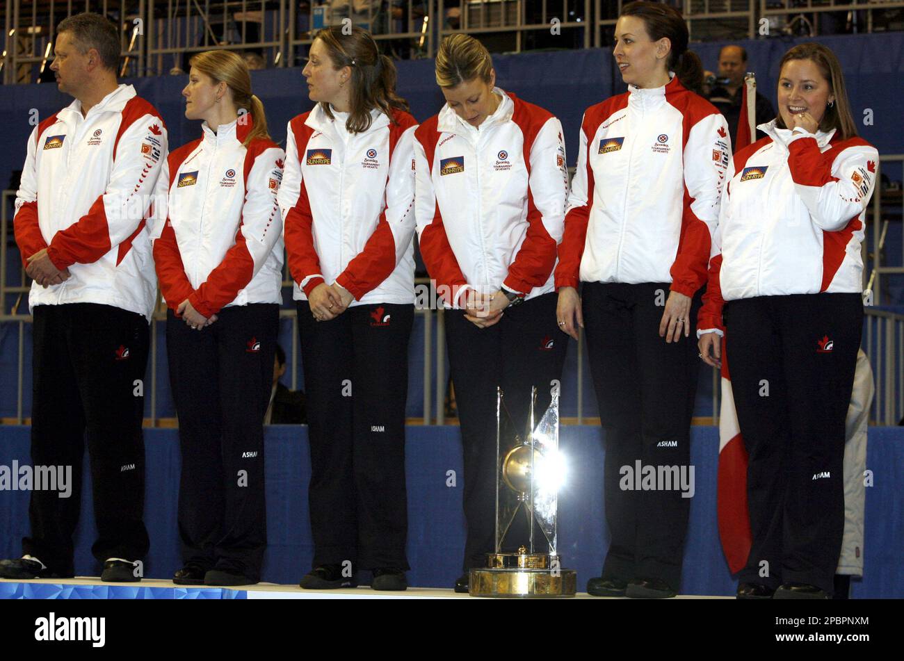 Canada's skip Kelly Scott at right reacts near her teammates and coach ...