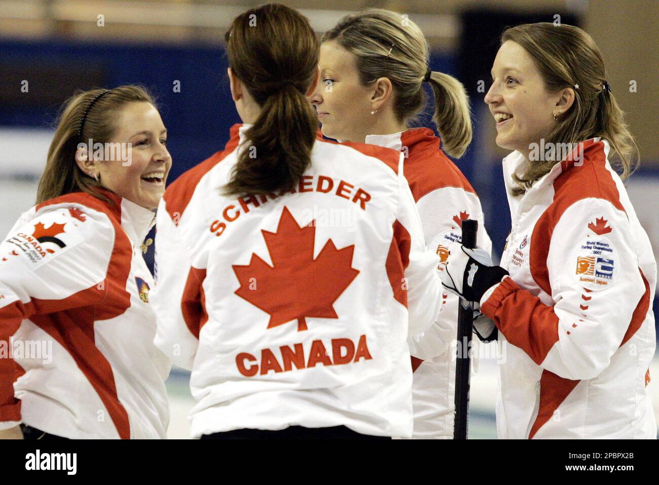 Canada's skip Kelly Scott, left celebrates with teammates from right ...