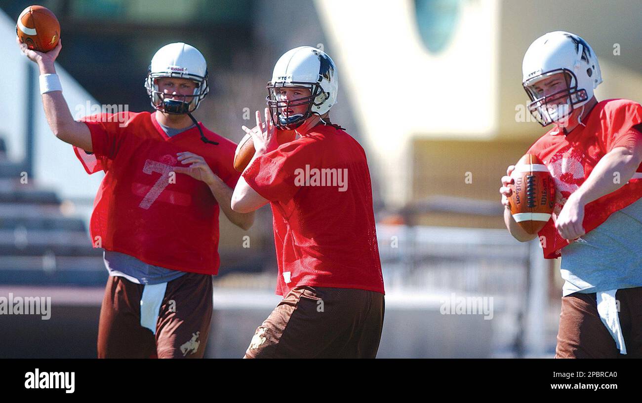 Wyoming quarterbacks, from left, Jacob Doss, Ian Hetrick, and Karsten ...