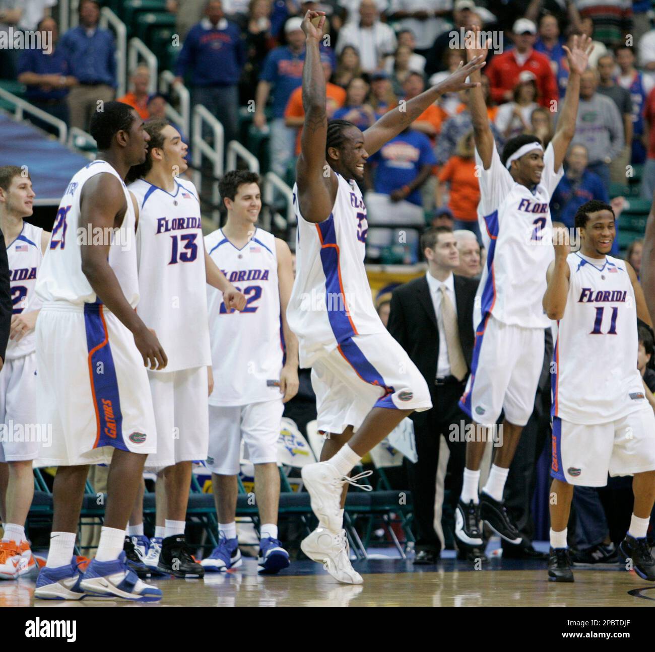 Florida players, from left foreground, Garrett Tyler, Joakim Noah, Jack ...