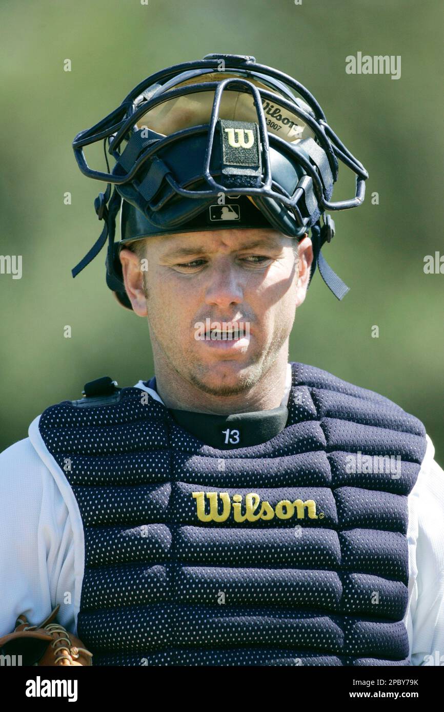 Detroit Tigers catcher Vance Wilson takes a break from his duties ...
