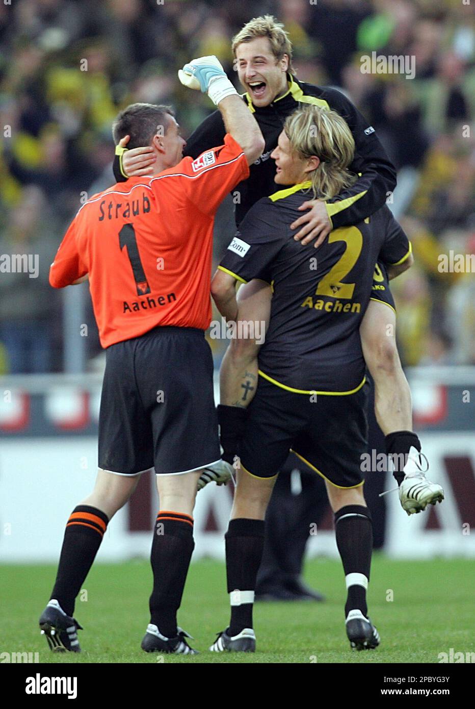 Aachen's goalkeeper Stefan Straub, from left, celebrates with Matthias ...