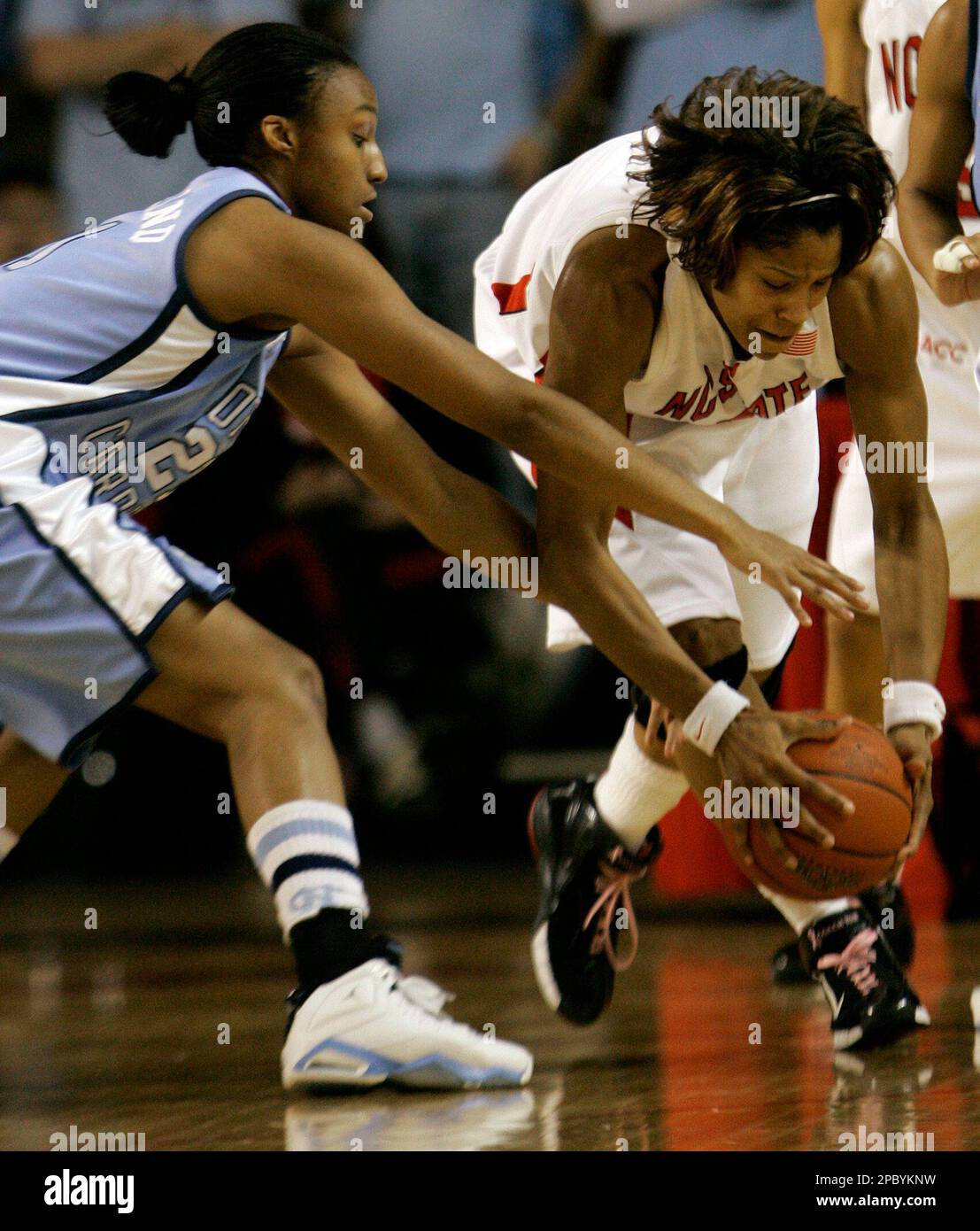 North Carolina's Iman McFarland, left, and North Carolina State's ...