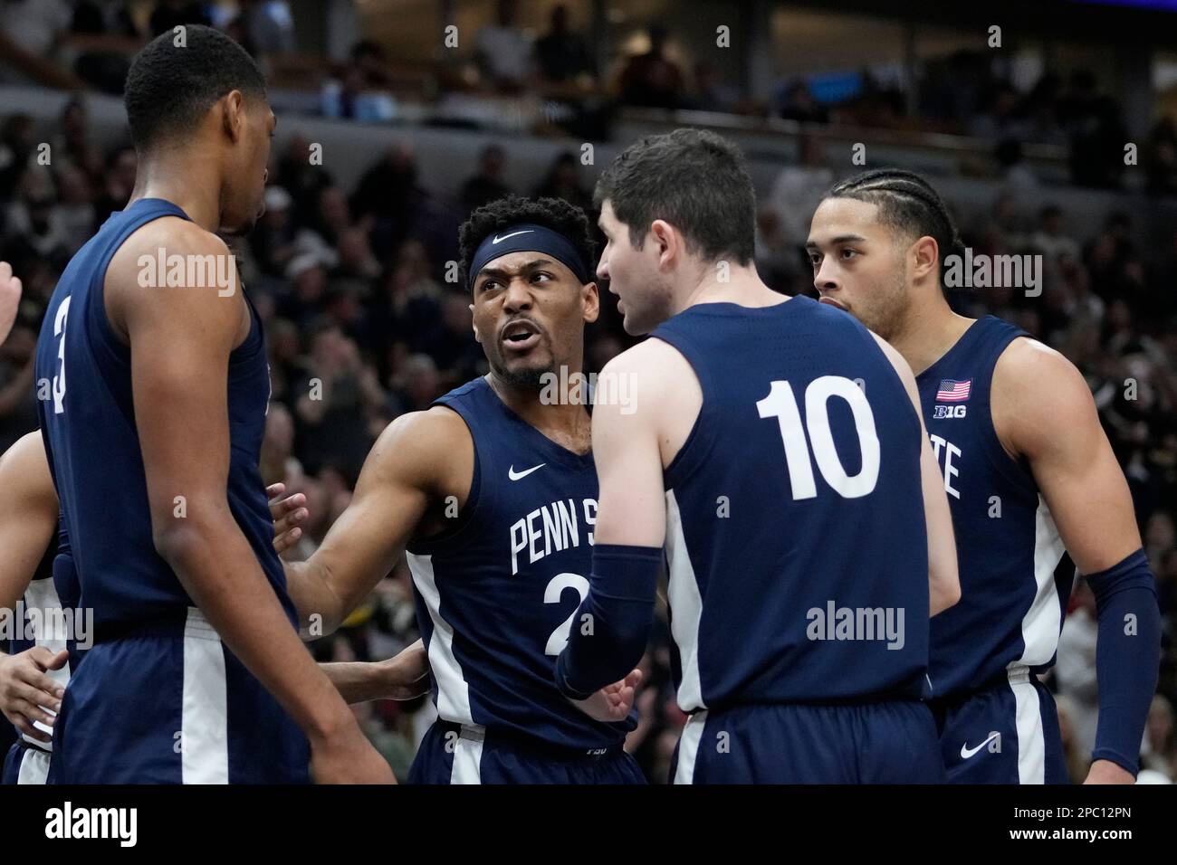 Penn State's Jalen Pickett talks with Kebba Njie (3), Andrew Funk (10 ...