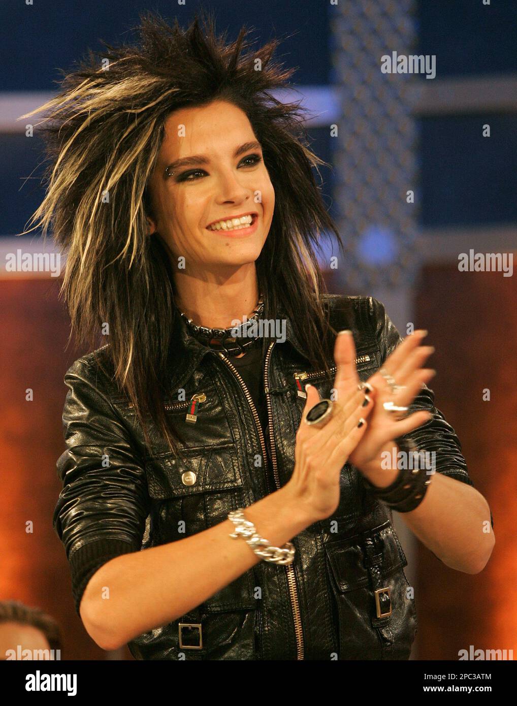 Lead singer of the German pop group 'Tokio Hotel' Bill Kaulitz applauds ...