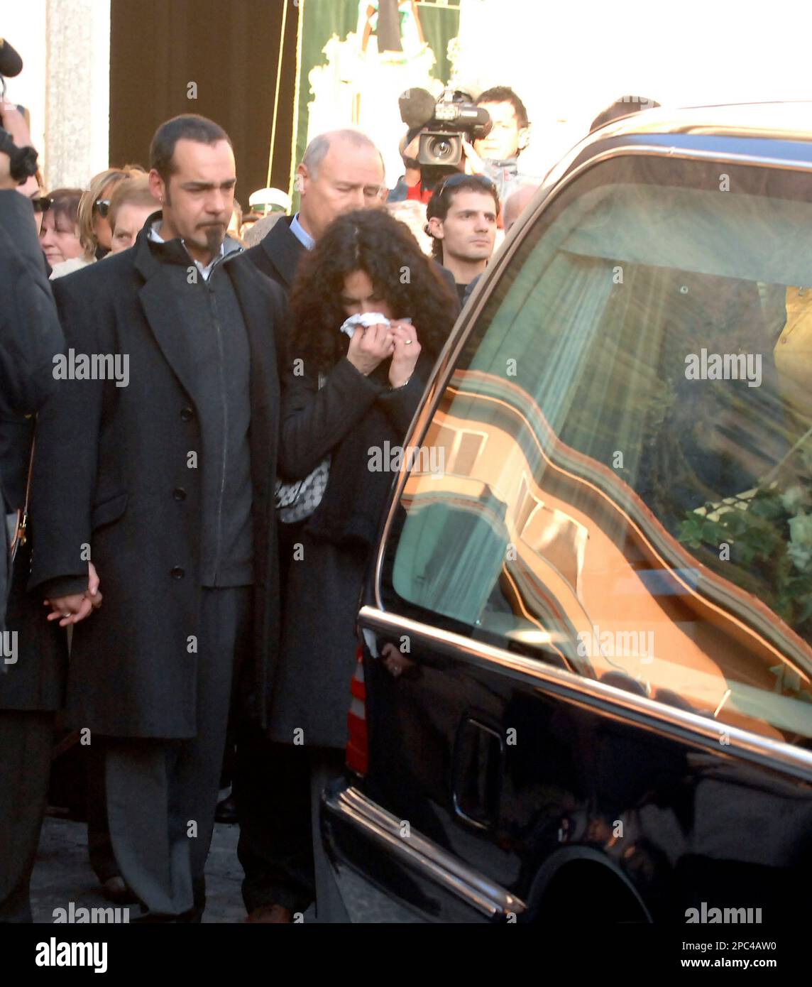 Valeria Cherubini's sons Andrea and Elena attend the funeral of their ...