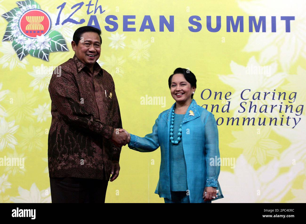 Indonesian President Susilo Bambang Yudhoyono, left, is greeted by ...