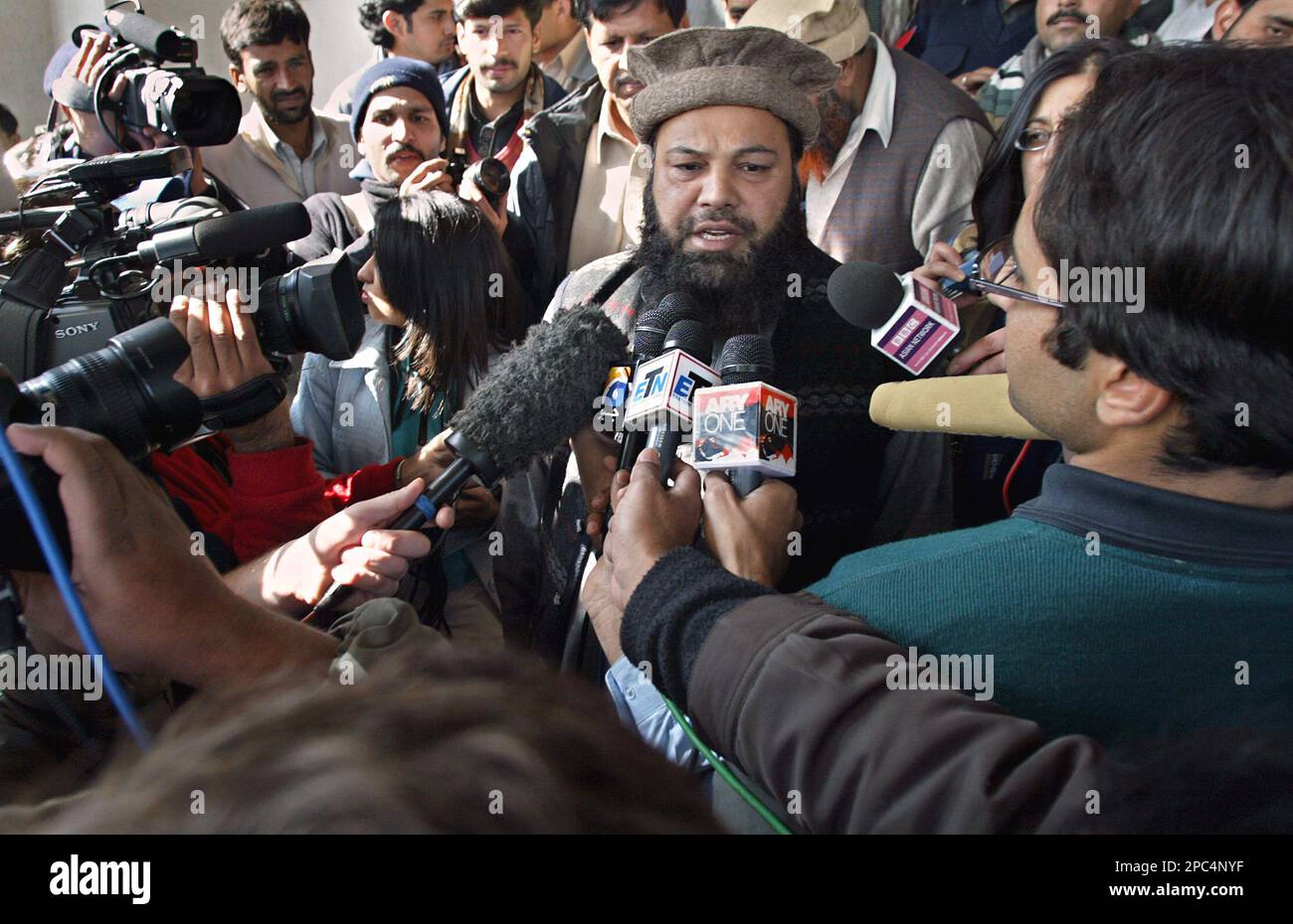 Sajad Ahmed Rana, center, father of Scottish girl Molly Campbell, also ...