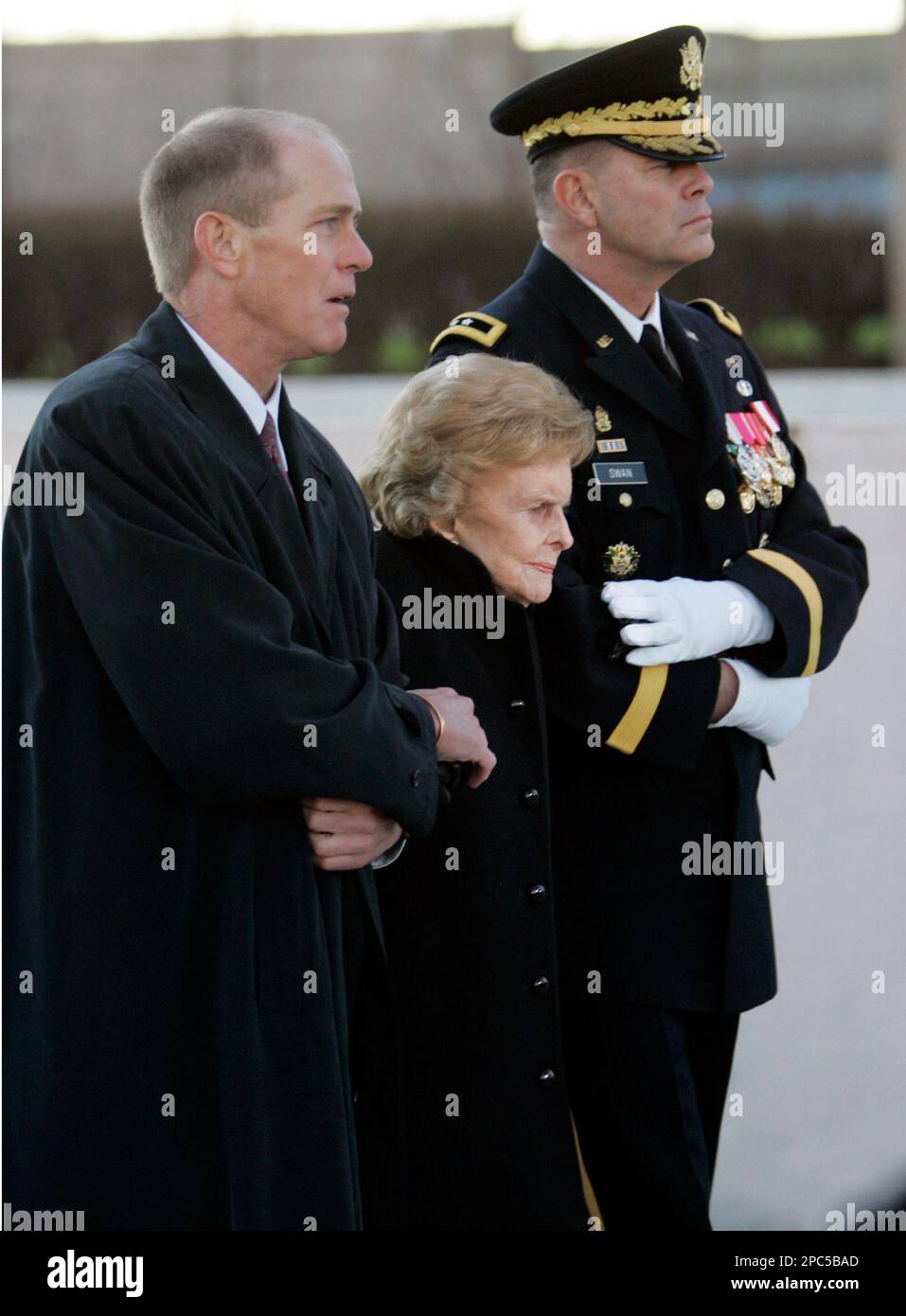 Betty Ford is escorted by her son Steven and Maj. Gen. Guy Swan III ...