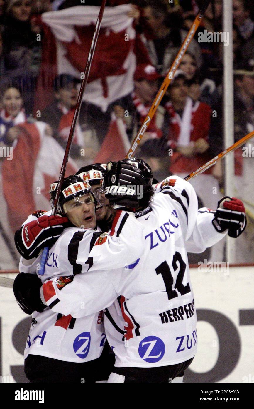 Team Canada's Stacy Roest, Tyler Wright and Chris Herperger, from left ...