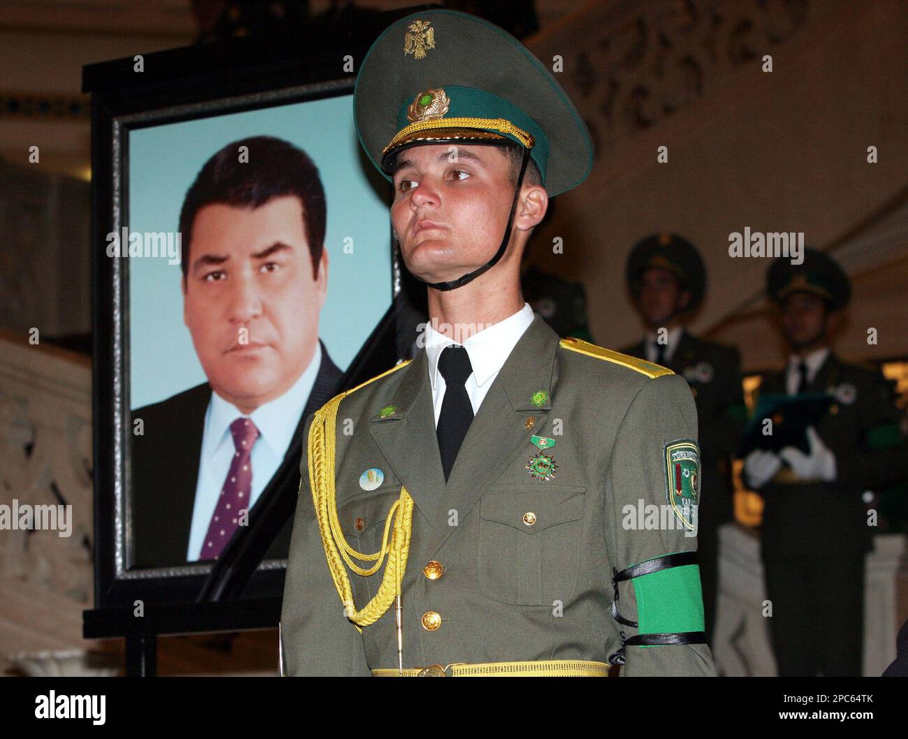 Turkmen soldiers stand at the coffin of the late President Saparmurat ...