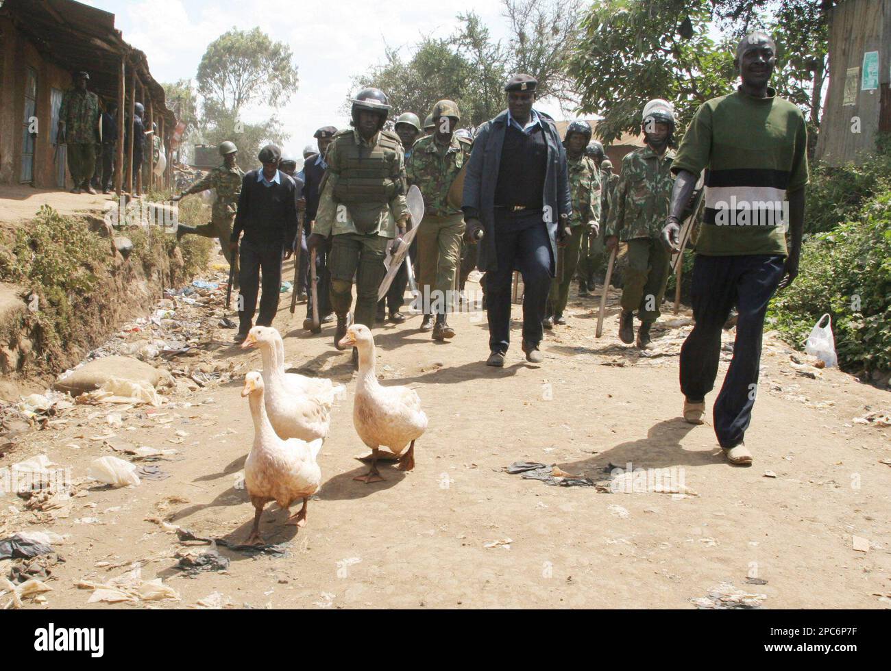 Riot police patrol in Kibera, a sprawling slum in the Kenyan capital of ...