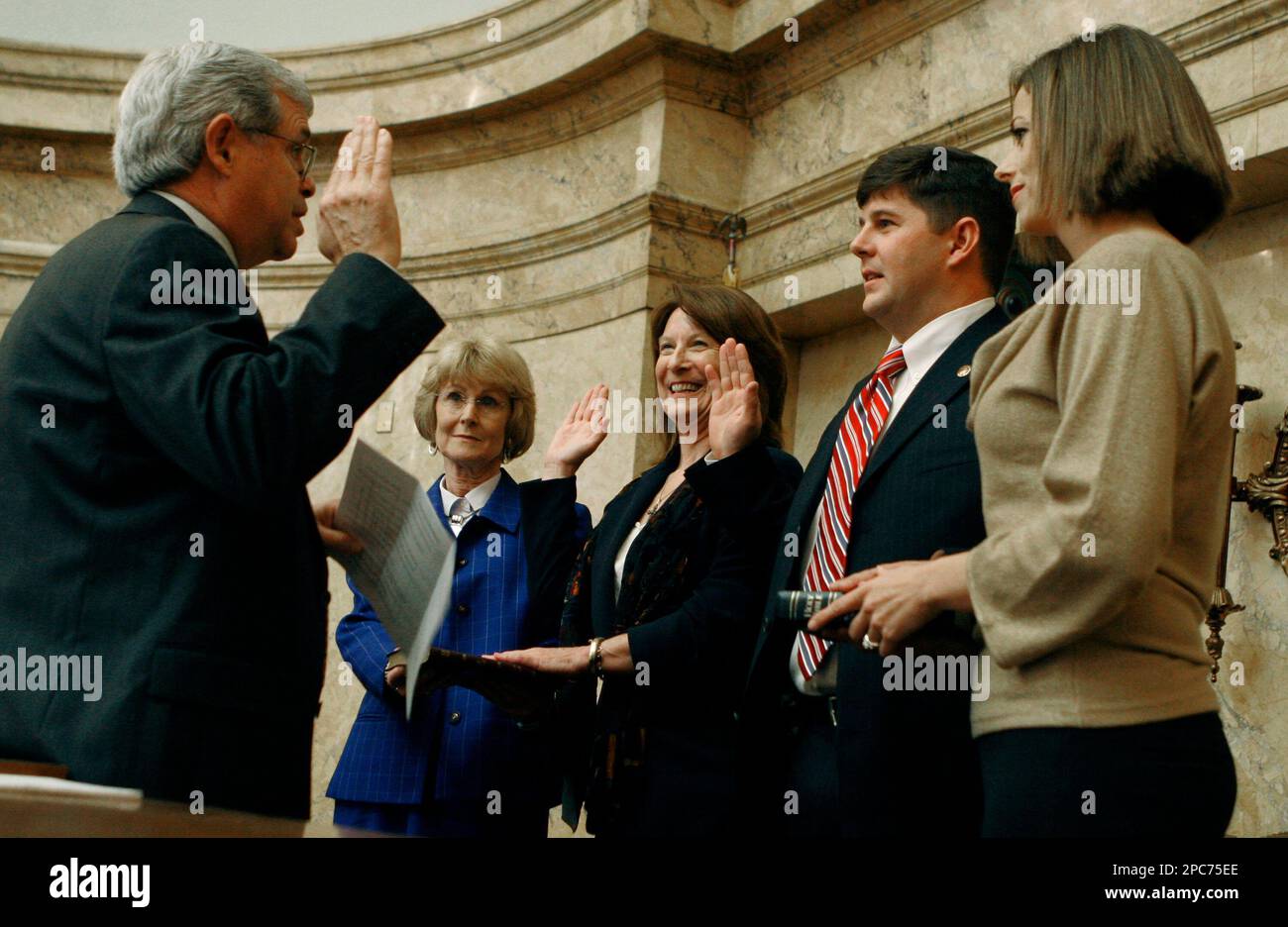 Speaker Pro-Tem J.P. Compretta, D-Bay St. Louis, foreground, gives the ...