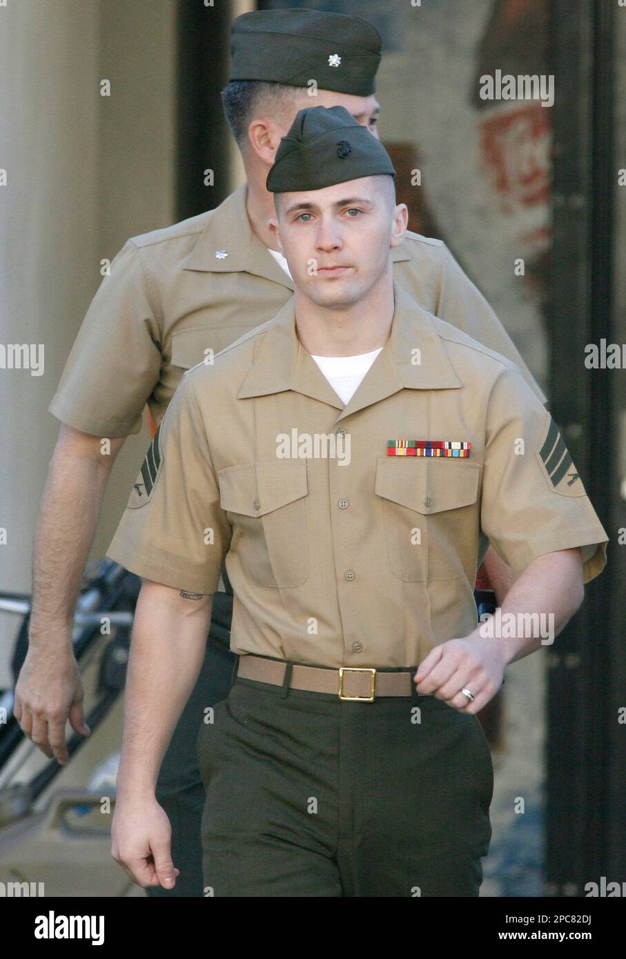 Marine Corps Sgt. Lawrence Hutchins, 22, of Plymouth, Mass., arrives ...
