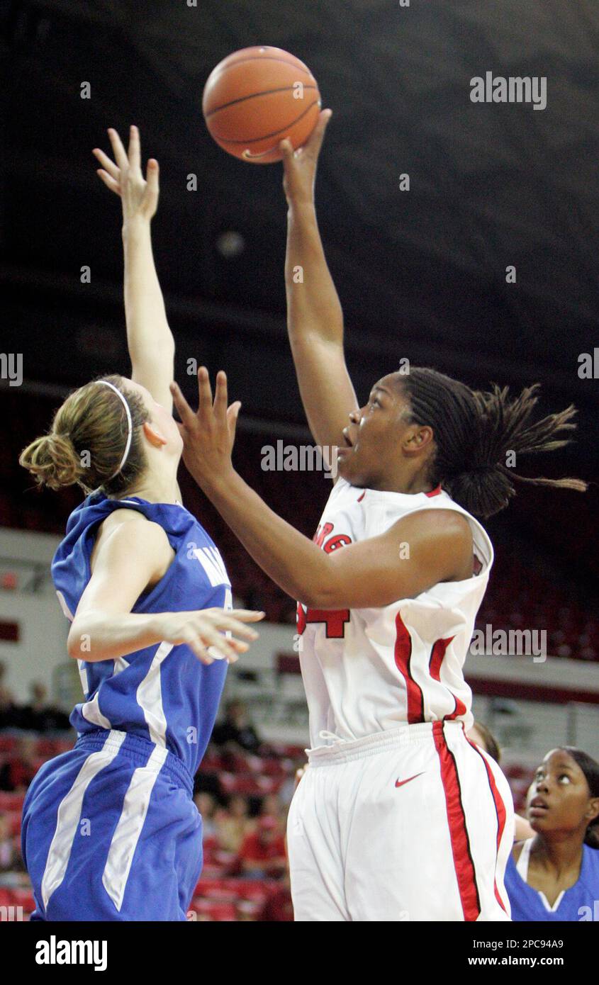 Georgia's Tasha Humphrey, right, puts up a shot over Memphis' Megan ...