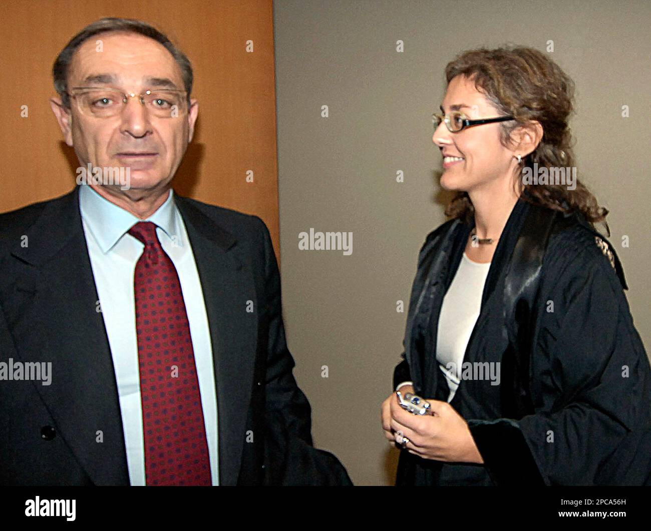 Lawyer Carlo Taormina talks with Paola Savio, the new Annamaria ...