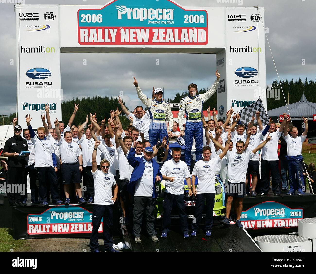 Finland's Marcus Gronholm, right, and his co-driver Timo Rautiainen ...