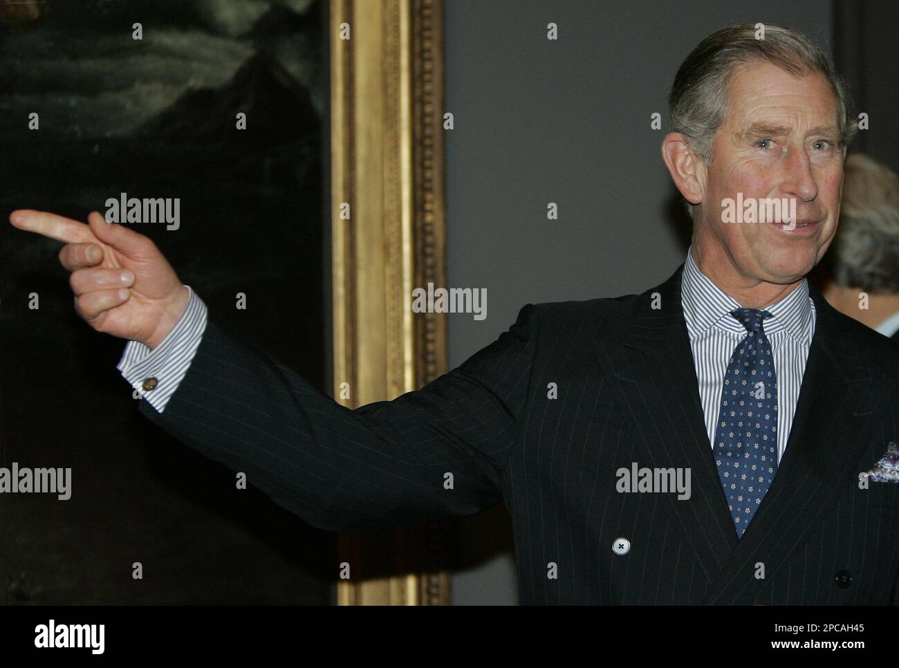 Britain's Prince Charles, gestures towards a painting by Sir Joshua ...
