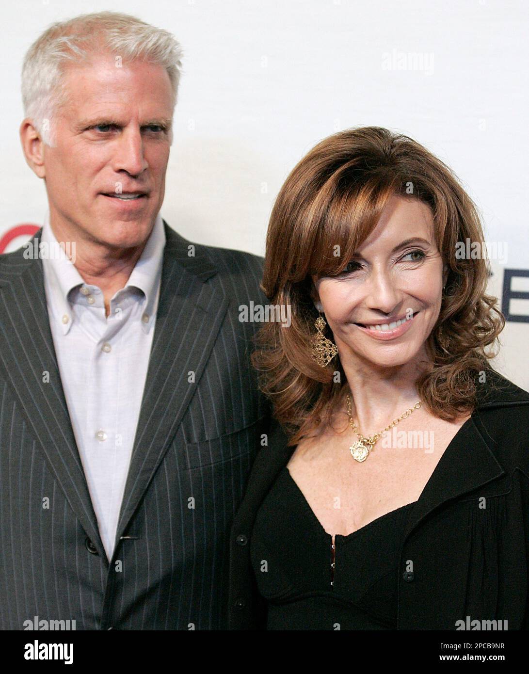 Actor Ted Danson, left, and wife actress Mary Steenburgen, right, pose ...