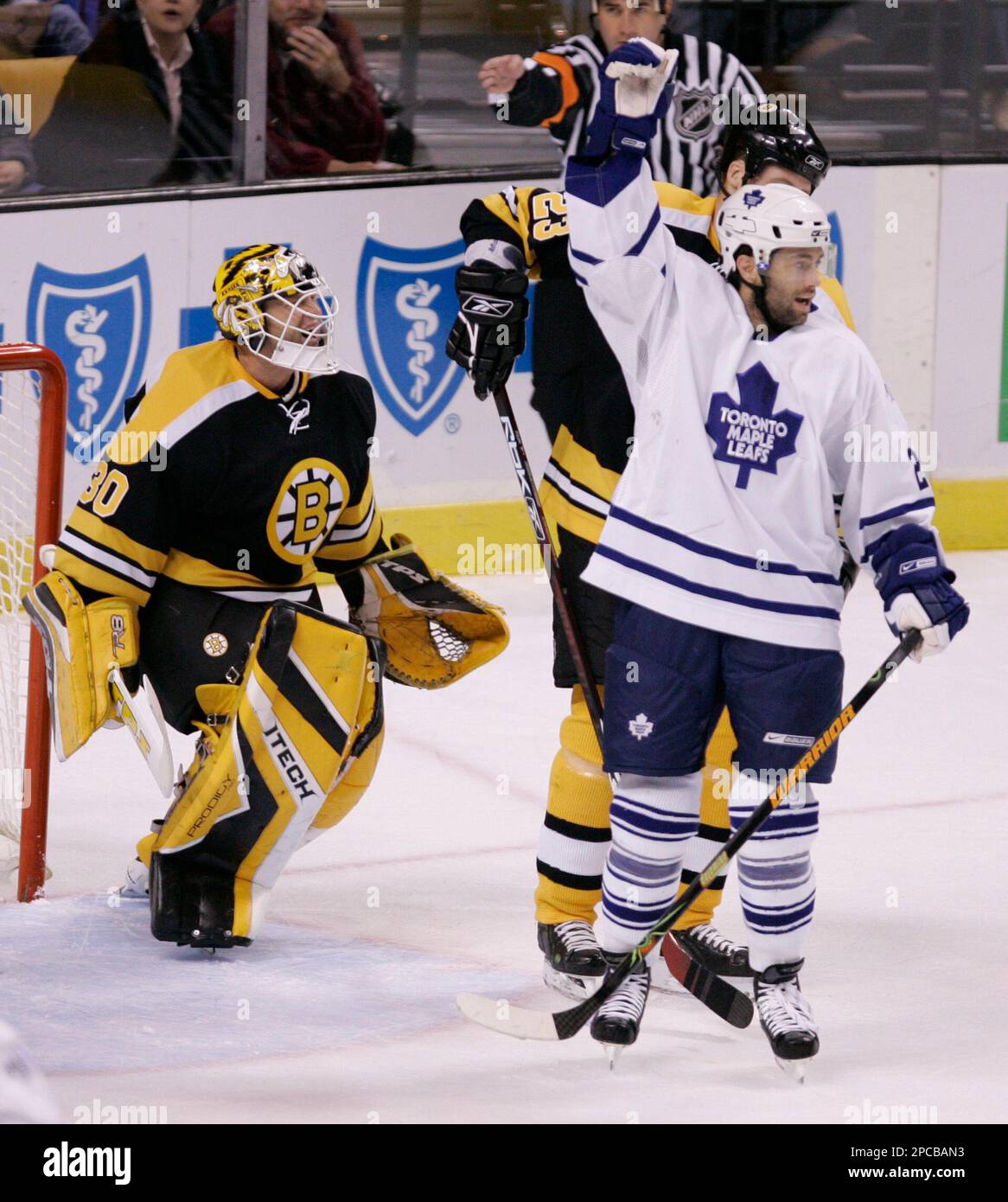 Toronto Maple Leafs center Michael Pecca, right, raises his hand after ...