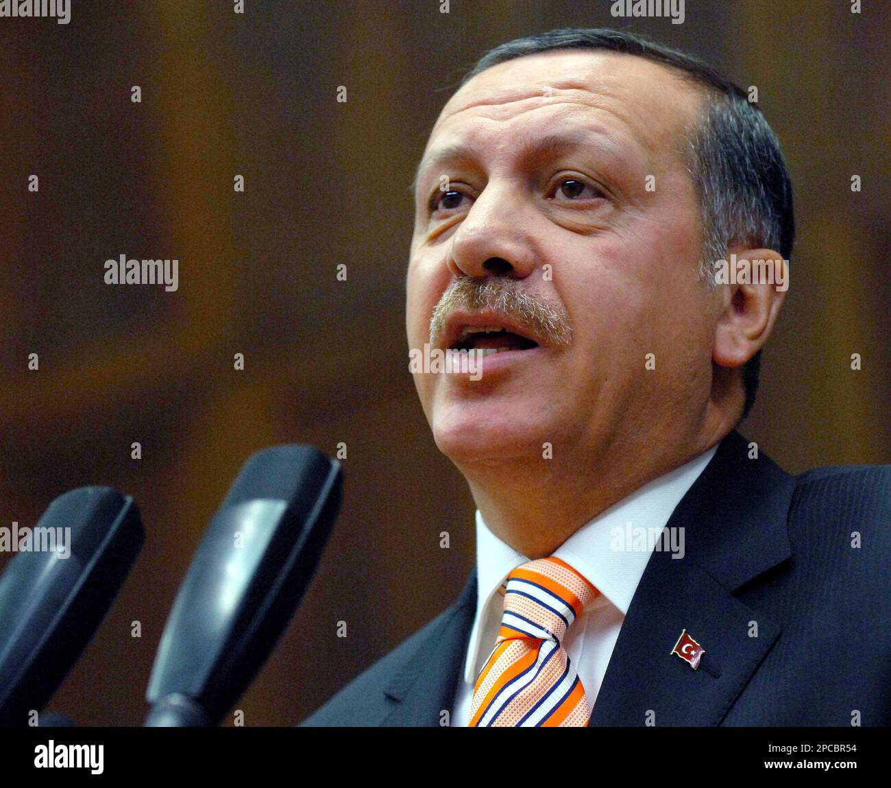 Turkish Prime Minister Recep Tayyip Erdogan addresses the lawmakers of ...