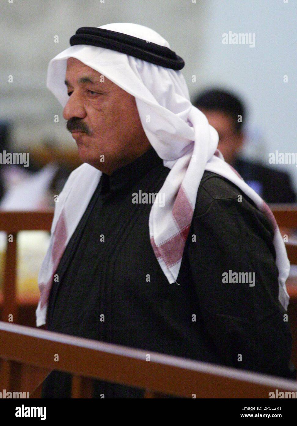 Former Iraqi vice president Taha Yassin Ramadan reacts after being ...