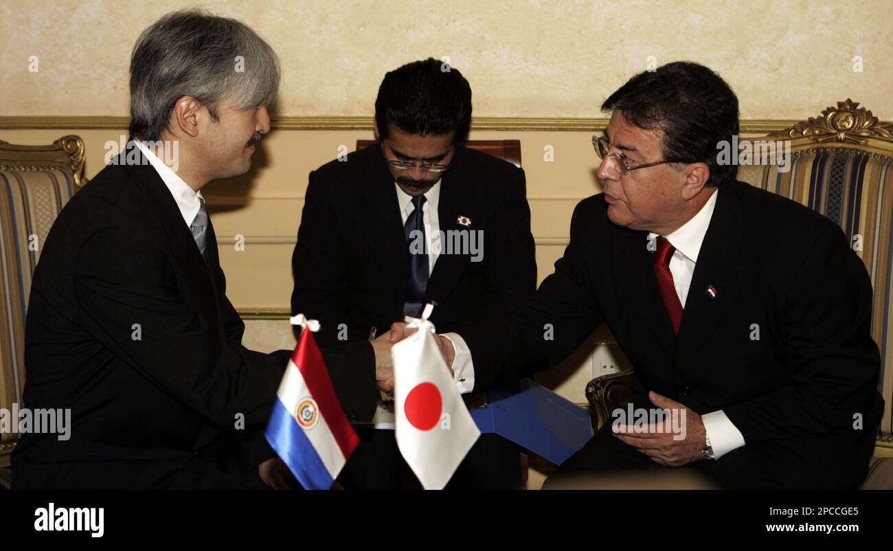 Japan's Prince Akishino, left shakes hands to Paraguay's President ...