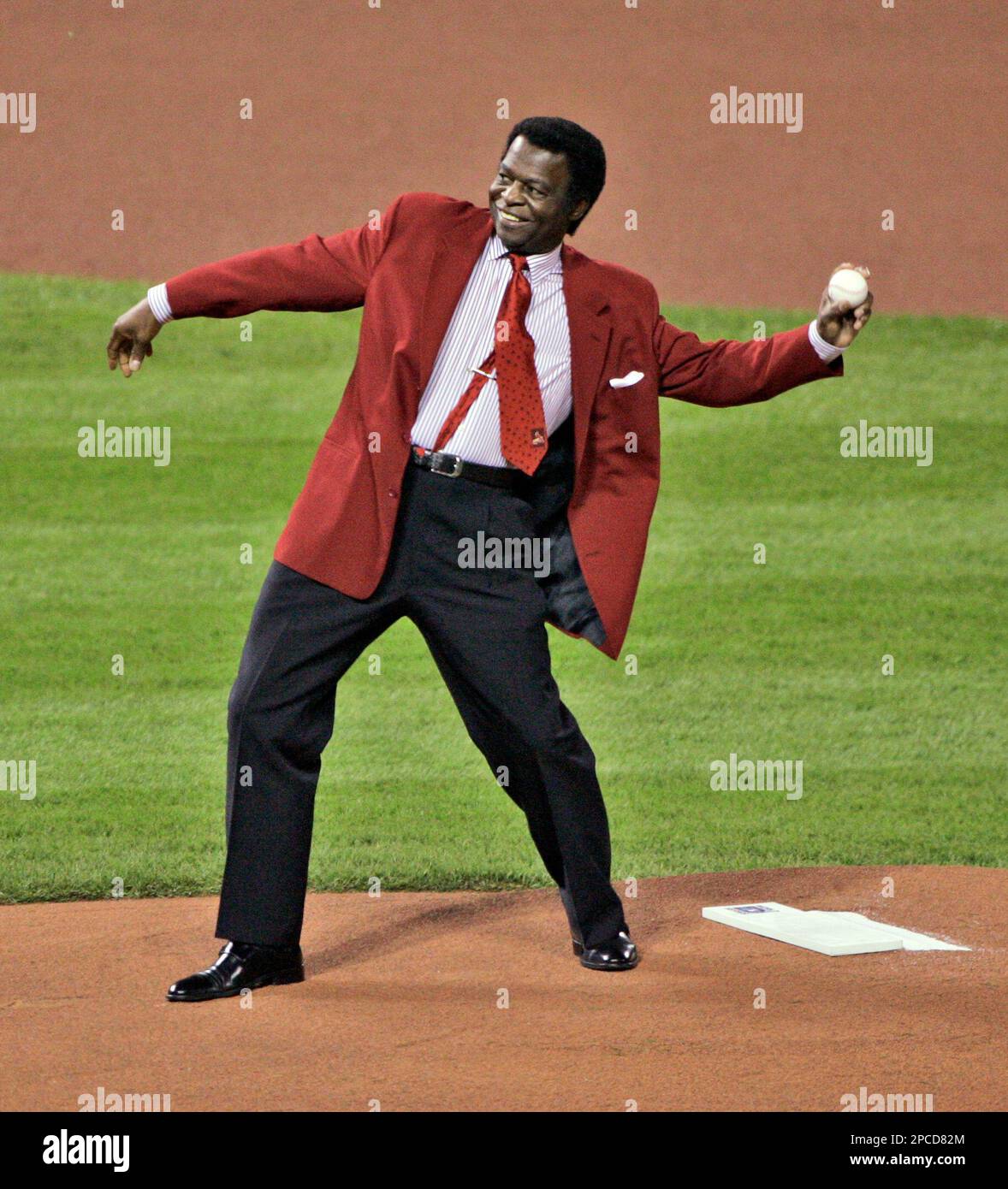 Hall of Famer and former St. Louis Cardinal, Lou Brock throws out the ...