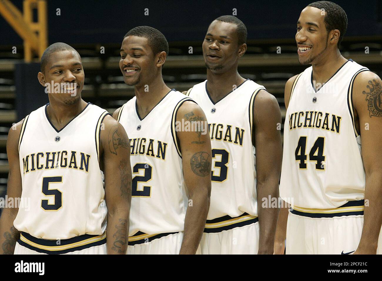 University of Michigan senior basketball players Dion Harris, from left ...