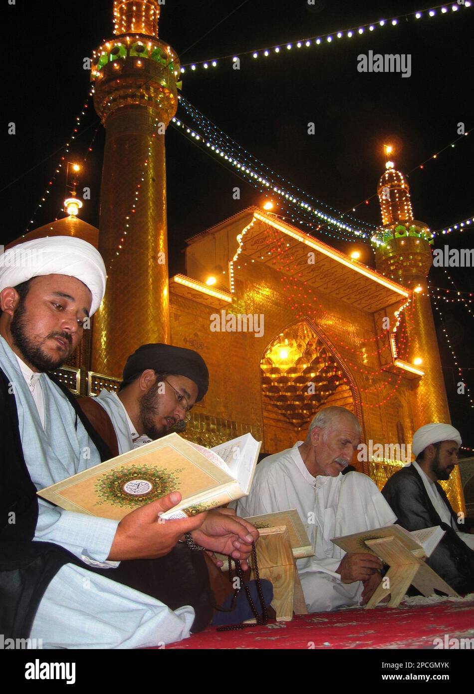 Iraqi Shiite Muslims read the Quran, Islam's holy book, on the first ...