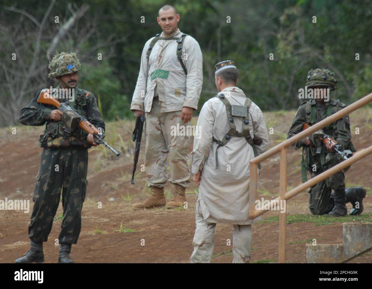 Indian troops, from the Gorkha Rifles battalion (in dark uniforms ...
