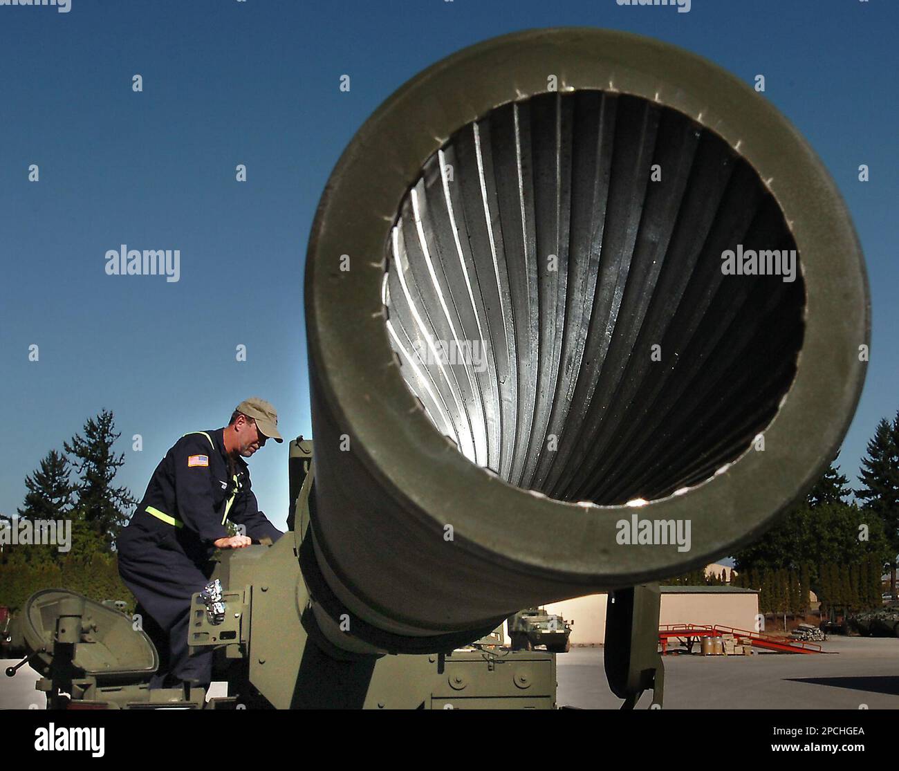 Tom Crooks works as the rifling inside the barrel of the 105mm cannon ...