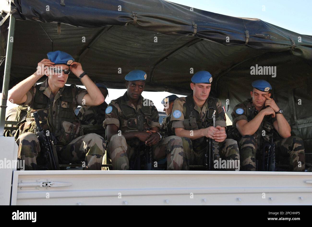 French U.N. peacekeepers sit in the back of a U.N. truck as they ...