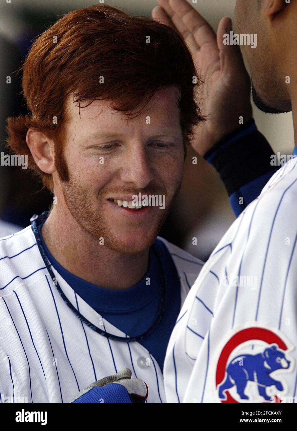 Chicago Cubs' Matt Murton, left, is congratulated by teammate Derrek ...
