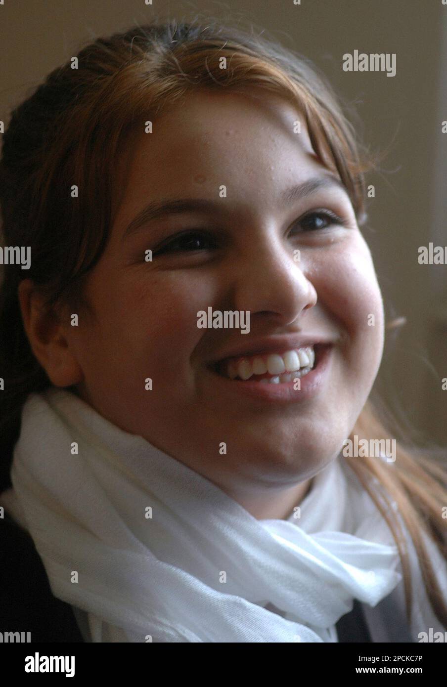 Scottish girl Molly Campbell, 12, shares a light moment with her ...