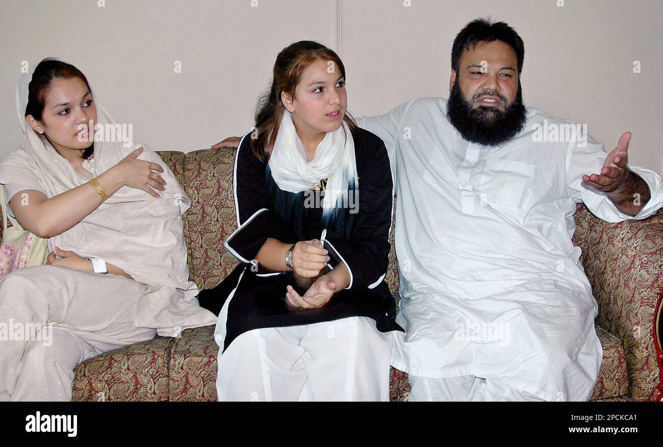 Scottish girl Molly Campbell, center, and her elder sister Tahmina Rana ...